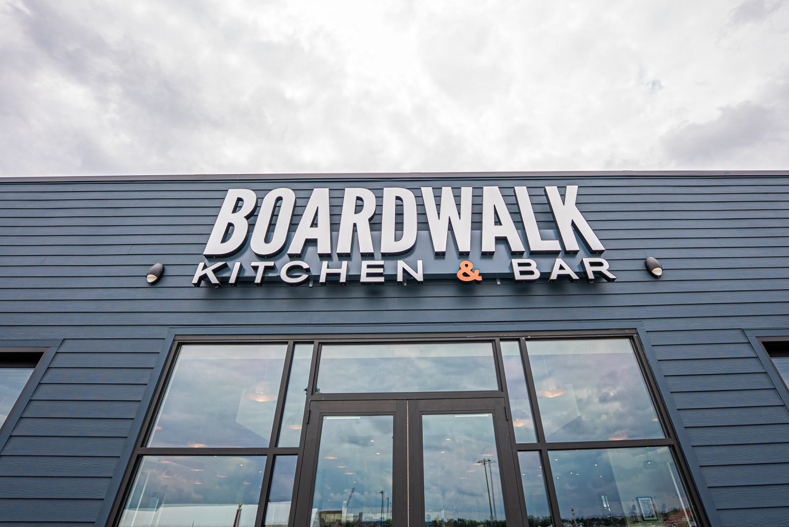 Boardwalk Kitchen & Bar Brings a Coastal Cool—and Racing Thrill—to ...